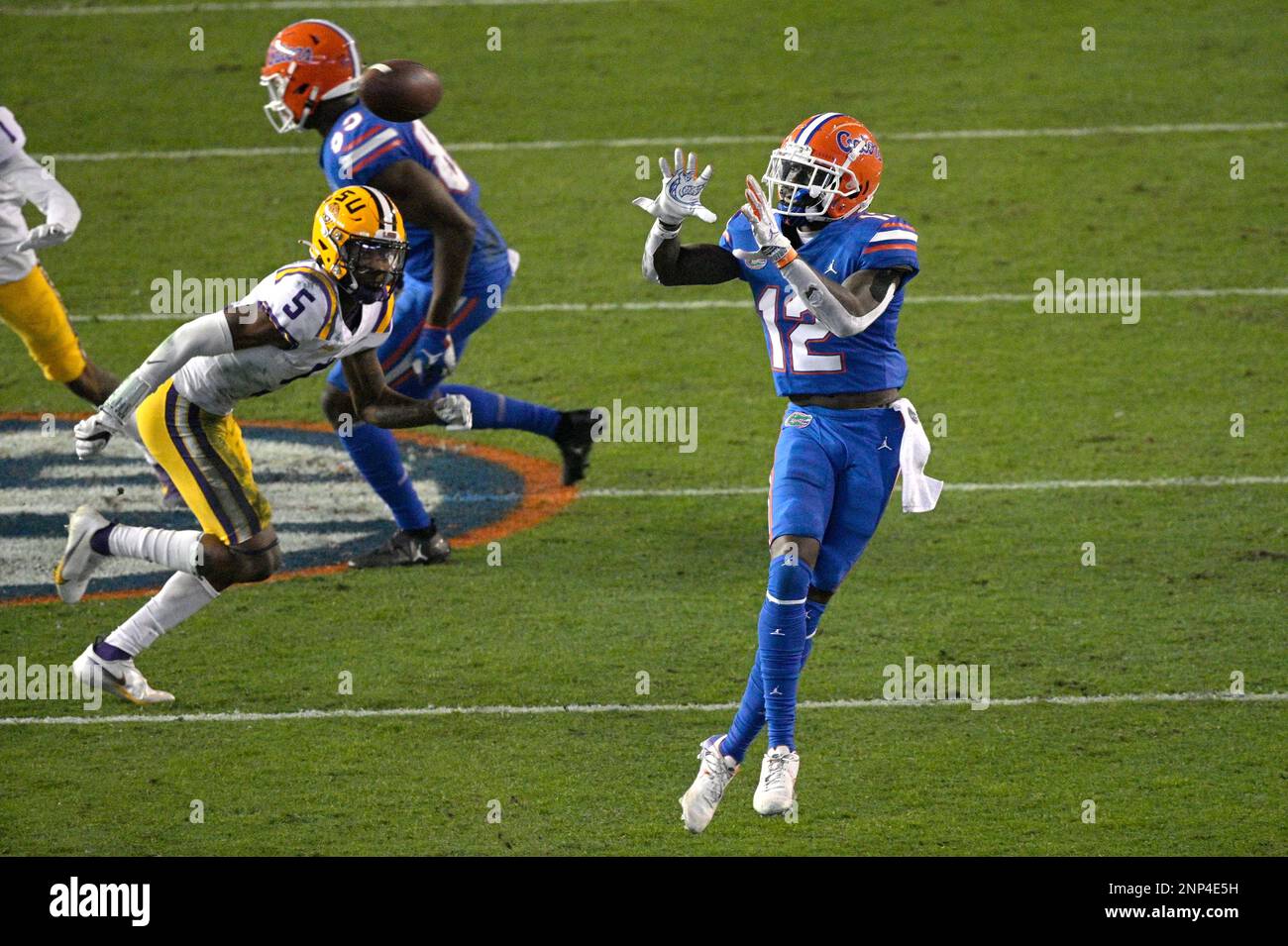 Florida wide receiver Rick Wells (12) catches a pass in front of LSU ...