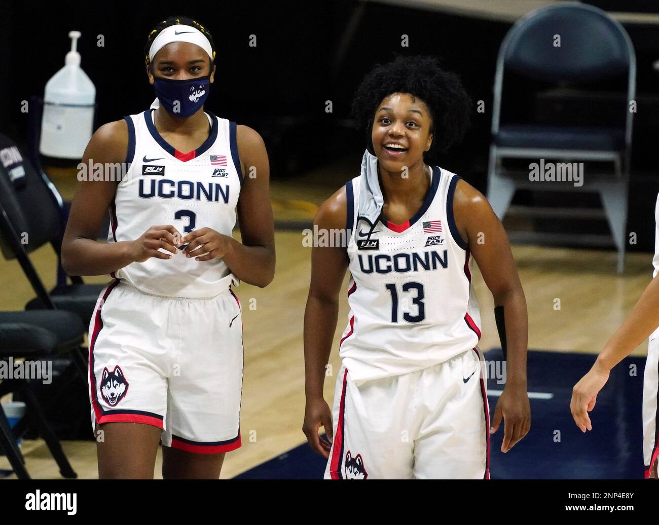 Connecticut guard Christyn Williams (13) reacts to the stadium display ...