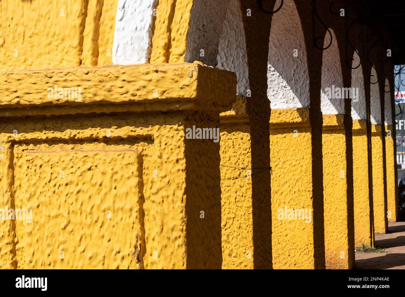 Detail of yellow arches of an old Portuguese era building in Fontainhas ...