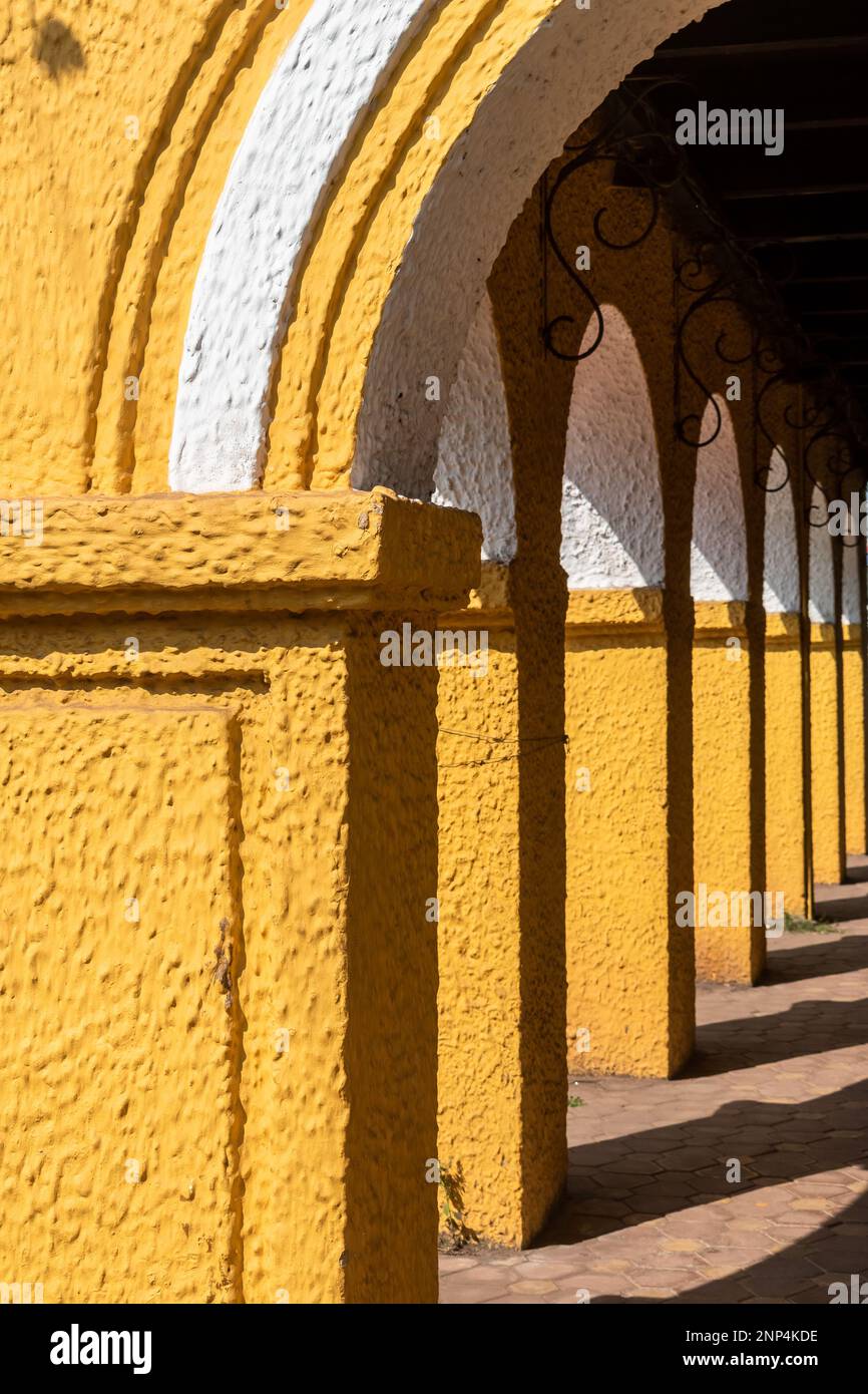 Detail of yellow arches of an old Portuguese era building in Fontainhas ...