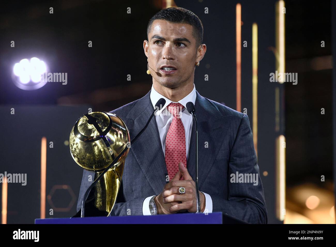 Cristiano Ronaldo poses with the trophy for player of the century at the Dubai Globe Soccer ...
