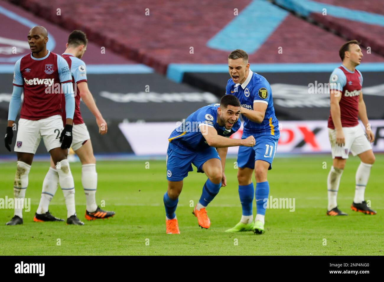 West Ham players stand defeated after Brighton's Neal Maupay, center ...