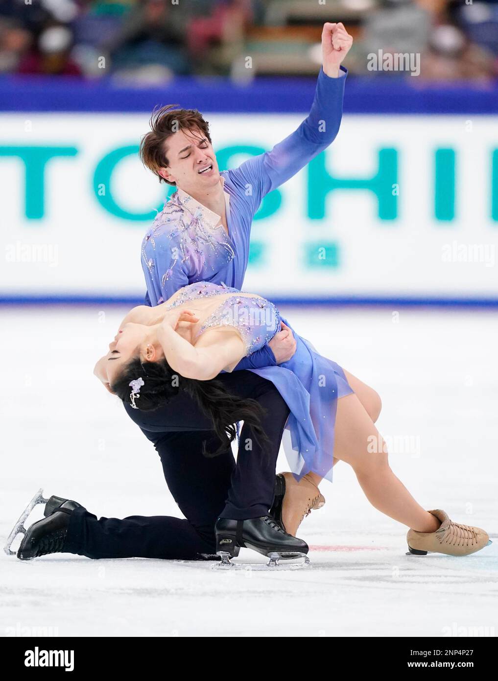 Japanese figure skaters Misato and Takashi Komatsubara perform during ...