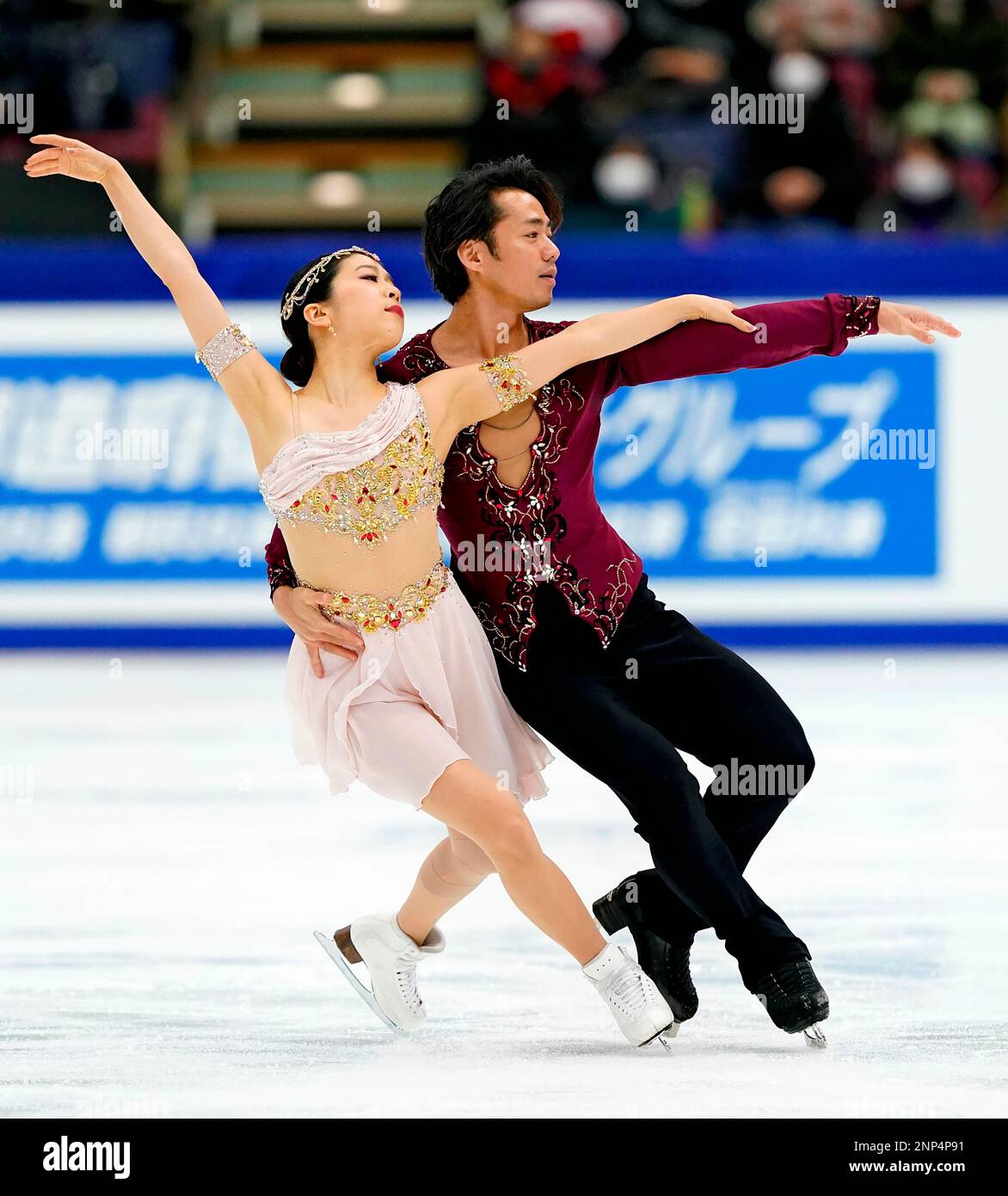 Japanese figure skaters Daisuke Takahashi and Kana Muramoto perform during the Ice Dance's Free ...