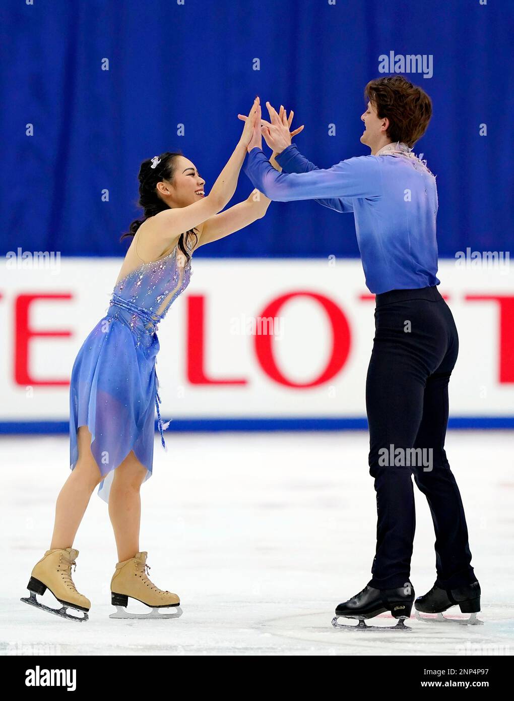 Japanese figure skaters Misato and Takashi Komatsubara perform during ...