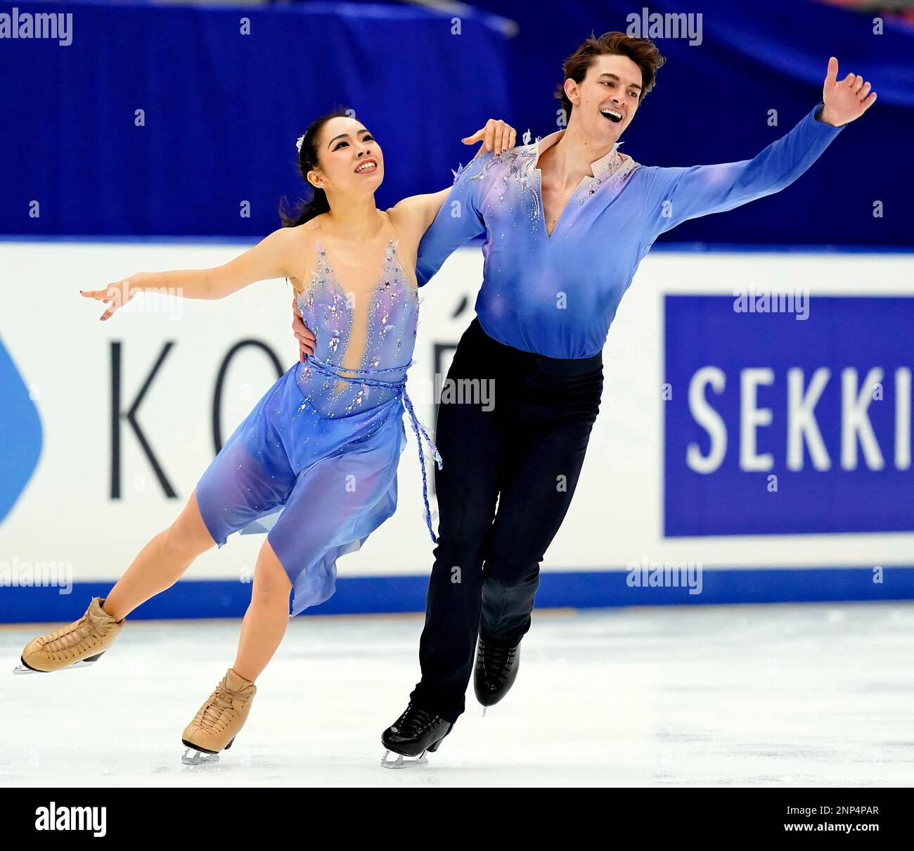 Japanese figure skaters Misato and Takashi Komatsubara perform during ...