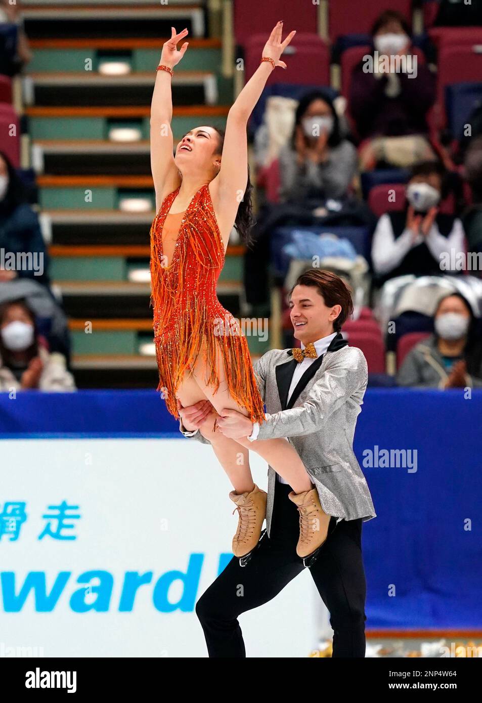 Japanese figure skaters Misato and Takashi Komatsubara perform during ...