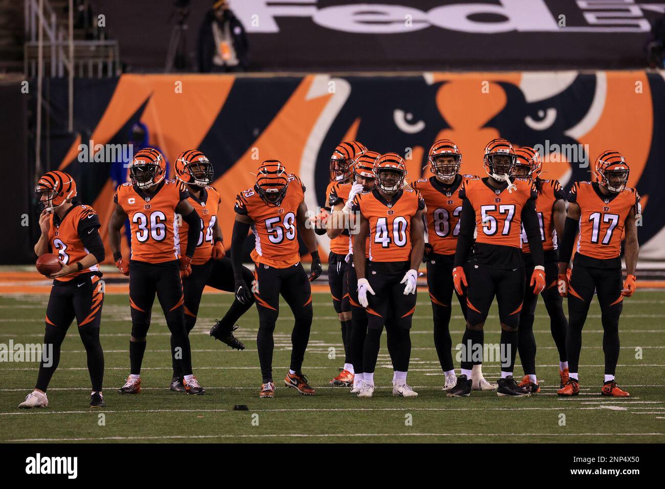 CINCINNATI, OH - DECEMBER 21: Cincinnati Bengals players stand on field ...