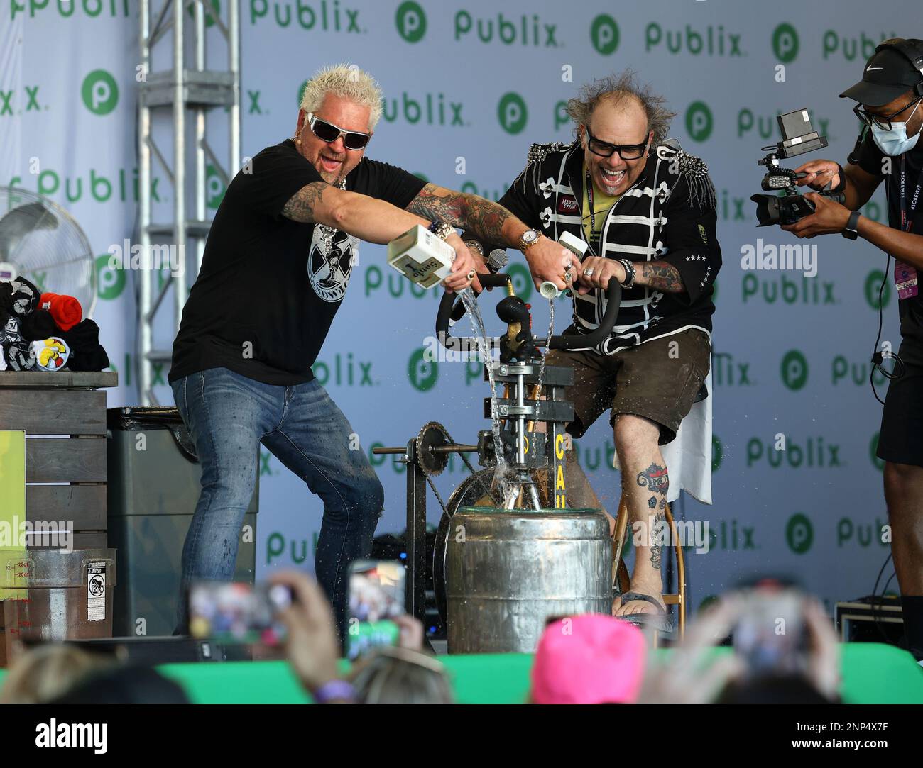 MIAMI BEACH, FL - FEBRUARY 25: Guy Fieri (L) and Stretch, also known as ...