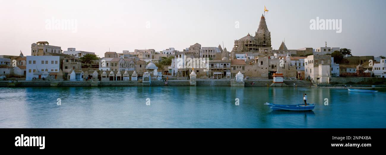 Buildings on river waterfront, Dwarka, Gujarat, India Stock Photo - Alamy