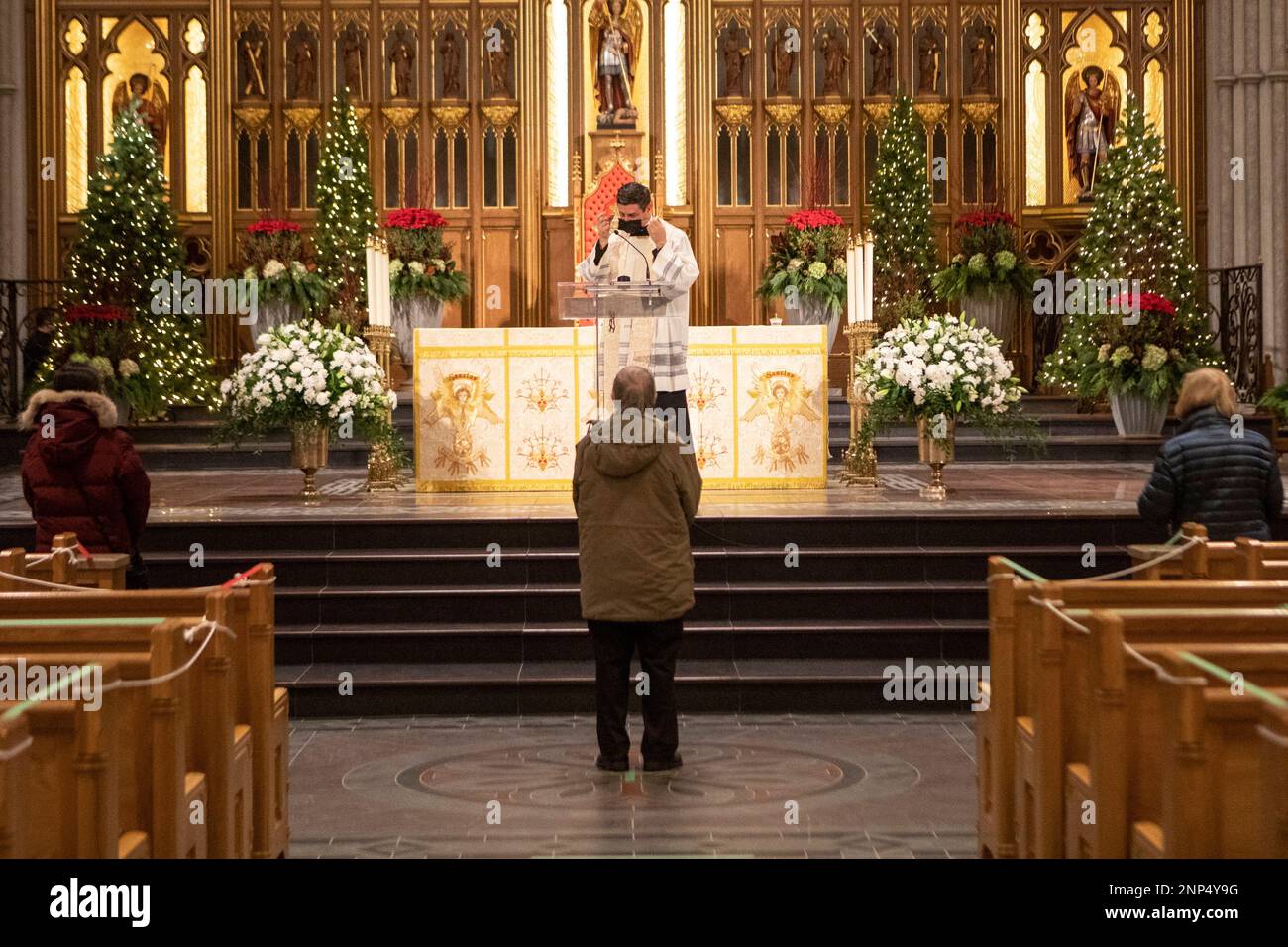 The Rev. Ed Curtis conducts Holy Communion services at St. Michael's ...