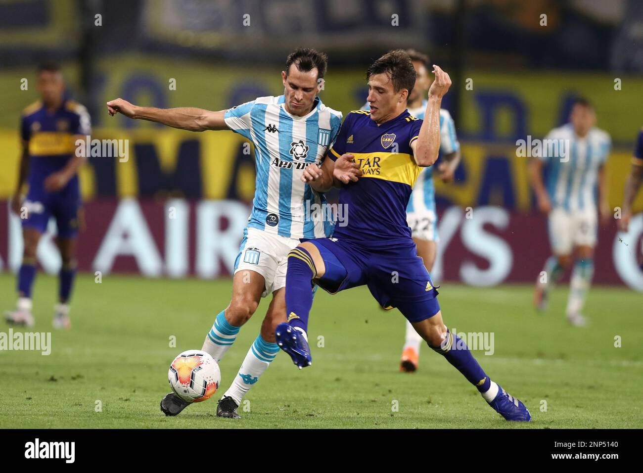 Augusto Solari of Argentina's Racing Club, left, and Nicolas Capaldo of ...
