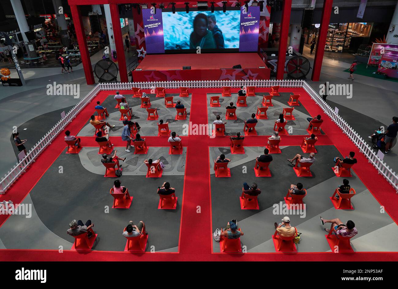 Safe distancing for the public watching a free movie screening at Our ...