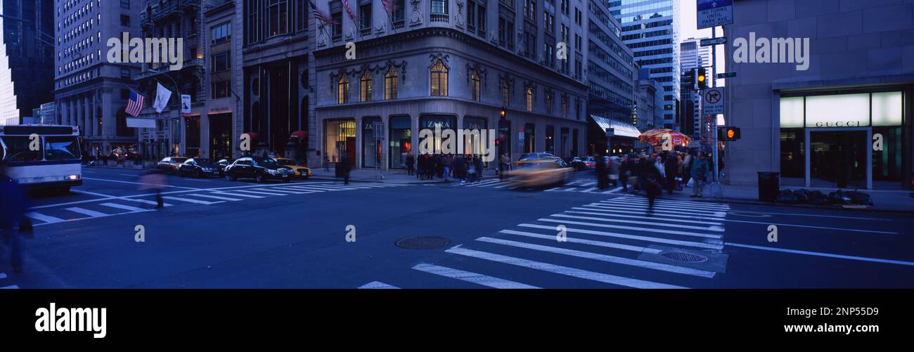 Road passing through buildings, Fifth Avenue, Manhattan, New York City ...