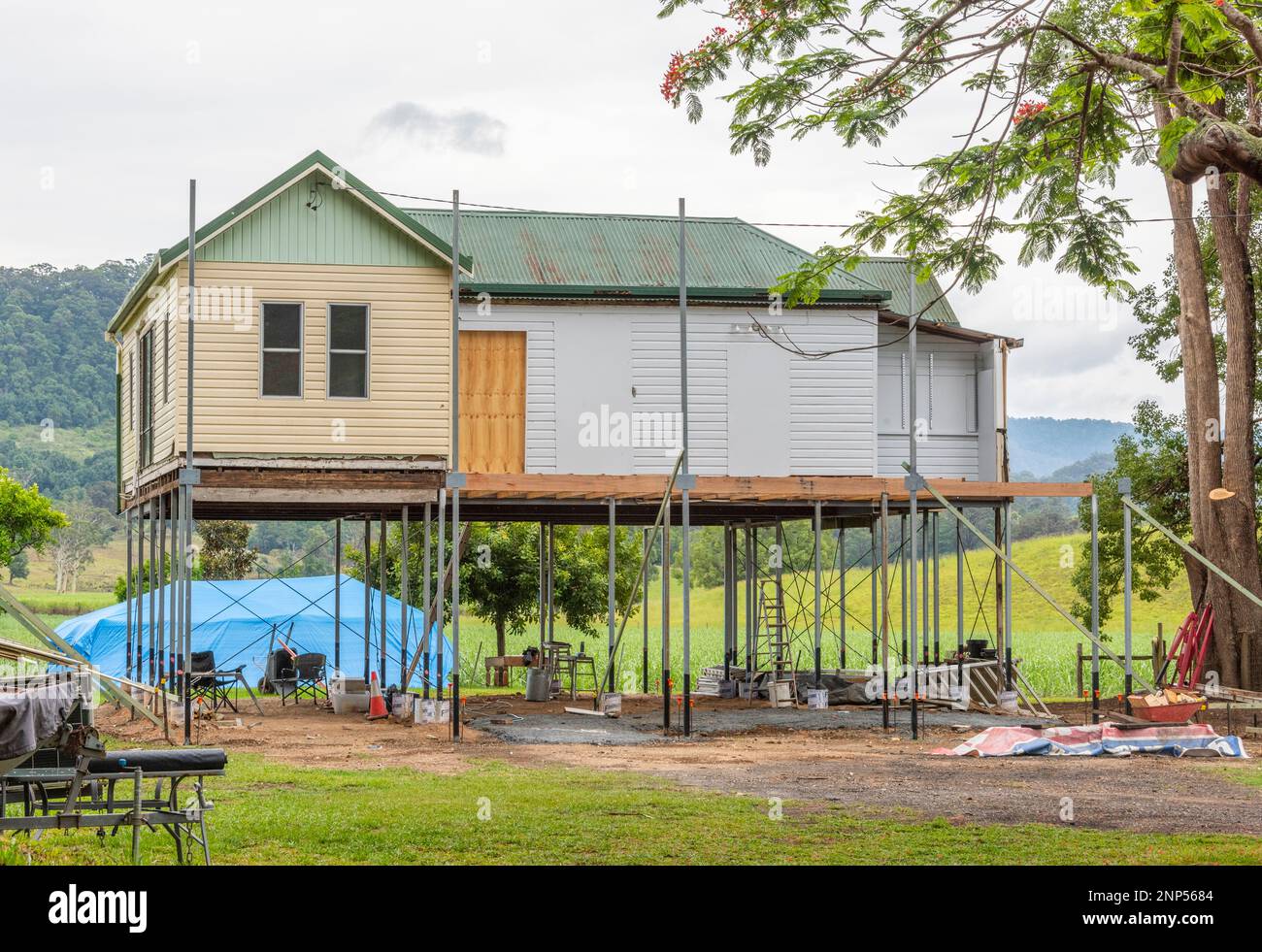 Flood effected house being raised on stilts near murwillumbah, new ...
