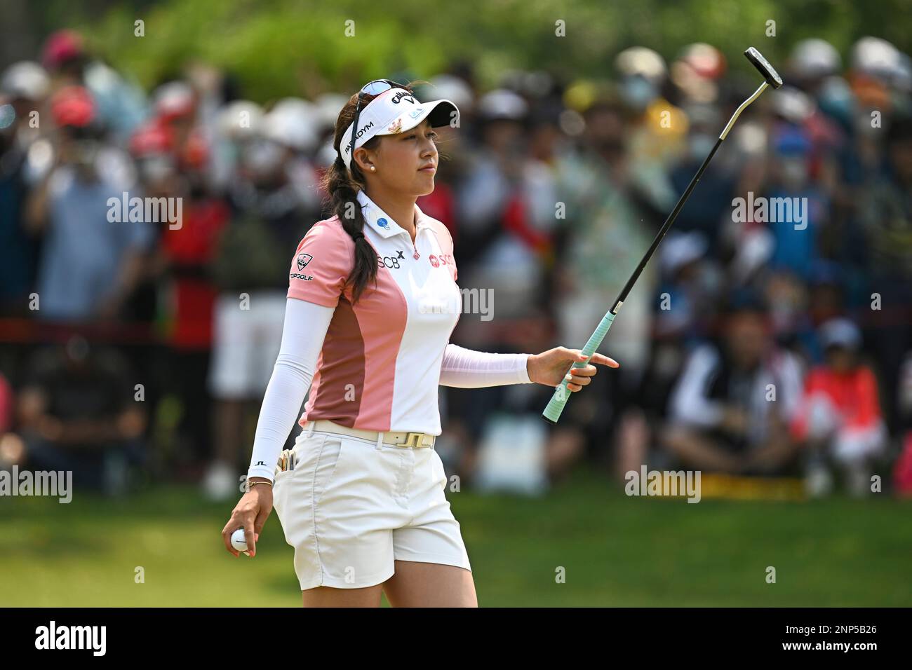 Atthaya Thitikul of Thailand reacts after her shot on the 6th hole ...