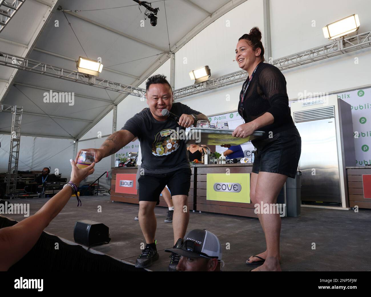 MIAMI BEACH, FL - FEBRUARY 25: Jet Tila (L) and Antonia Lofaso are seen ...