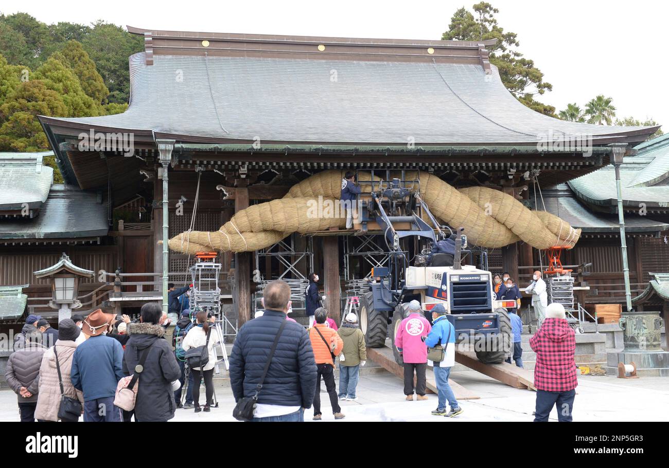O-shimenawa, a huge sacred Shinto rice straw festoon, is set on the ...