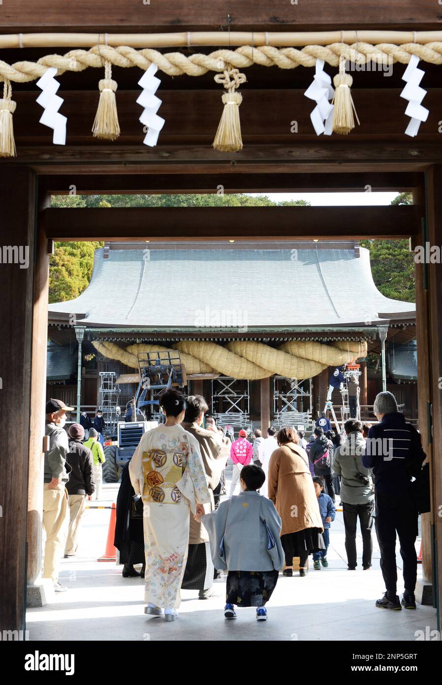 O-shimenawa, a huge sacred Shinto rice straw festoon, is set on the ...