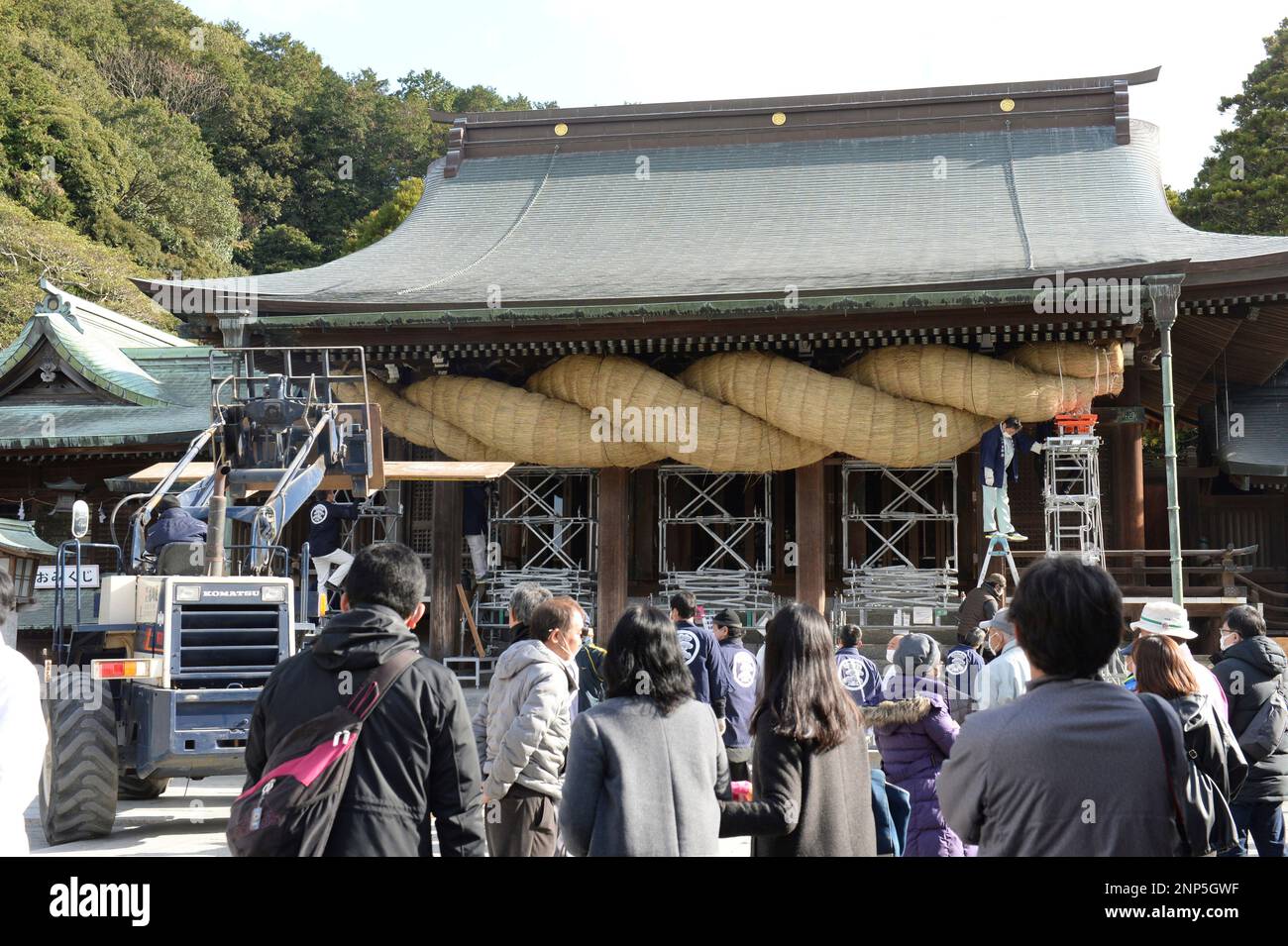 O-shimenawa, a huge sacred Shinto rice straw festoon, is set on the ...