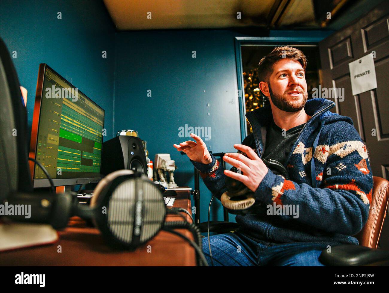 Singer and actor Eric Krop speaks in his music production studio at the ...
