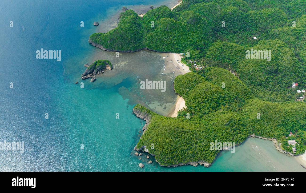 Tropical sandy beach and blue sea. Negros, Philippines Stock Photo - Alamy