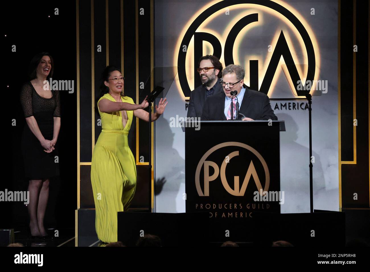 Tyson Bidner, from right, Josh Senior and Sandra Oh on stage at the ...