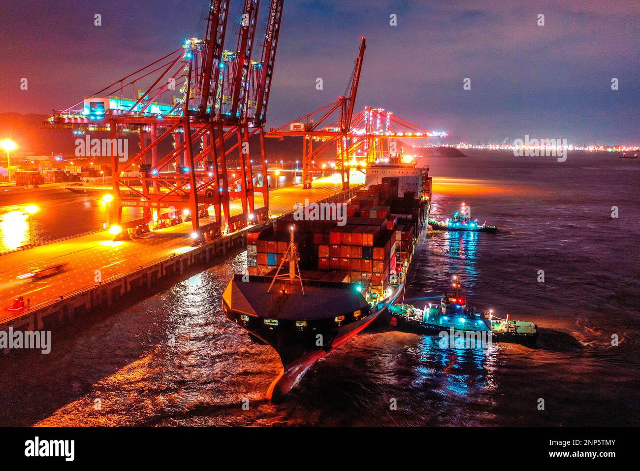 The Dapukou port is busy on shipping and unloading all day and night in ...