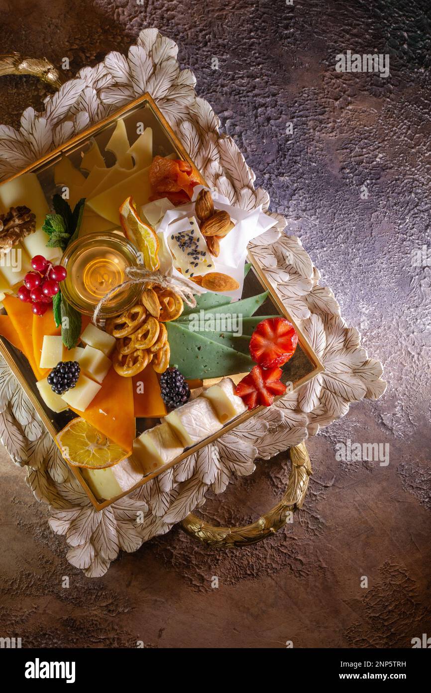 Different Types Of Cheese Slicing On The Table In A Cafe Top View