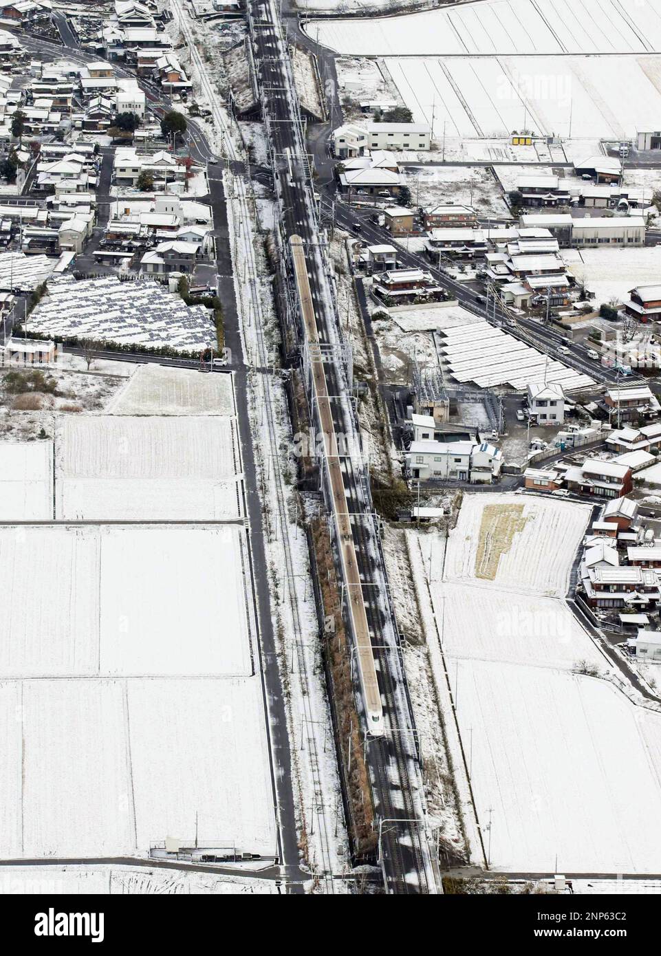 An aerial photo shows an urban area being lightly dusted in eastern ...