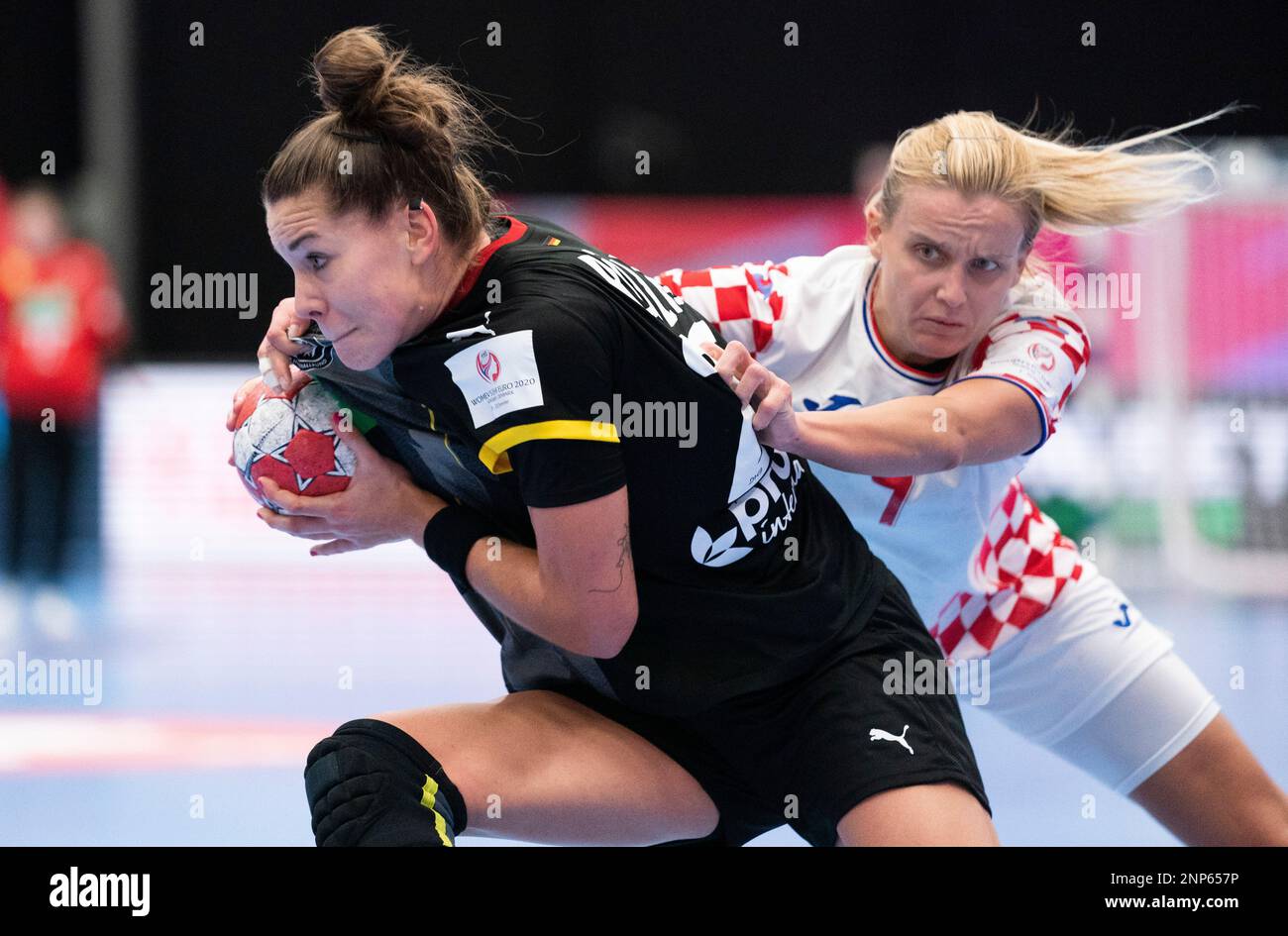Emily Boelk of Germany, left, and Camila Micijevic of Croatia battle ...