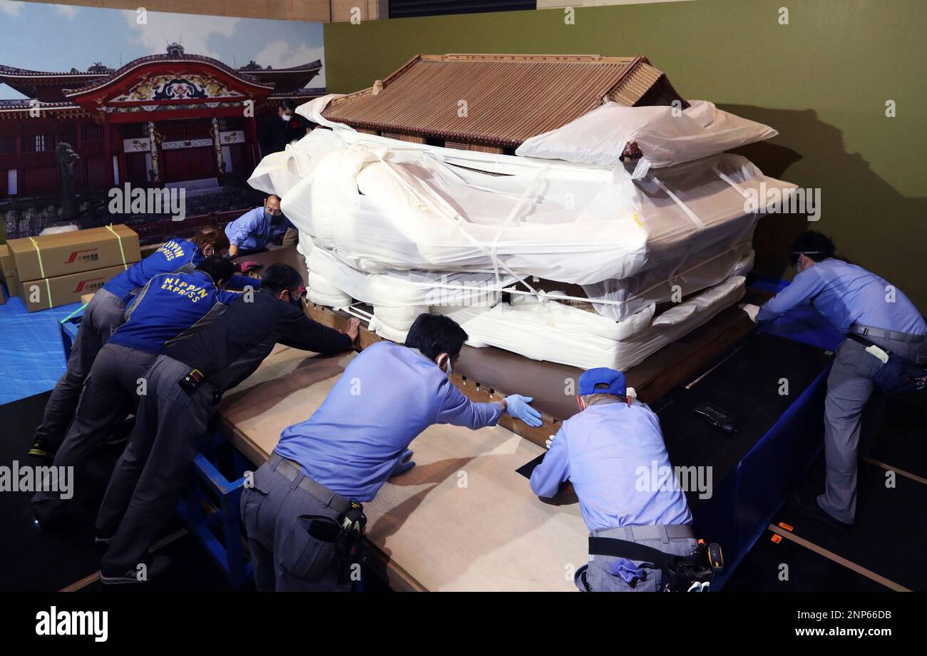 A model of Shuri Castle is brought into the Tokyo National Museum in ...