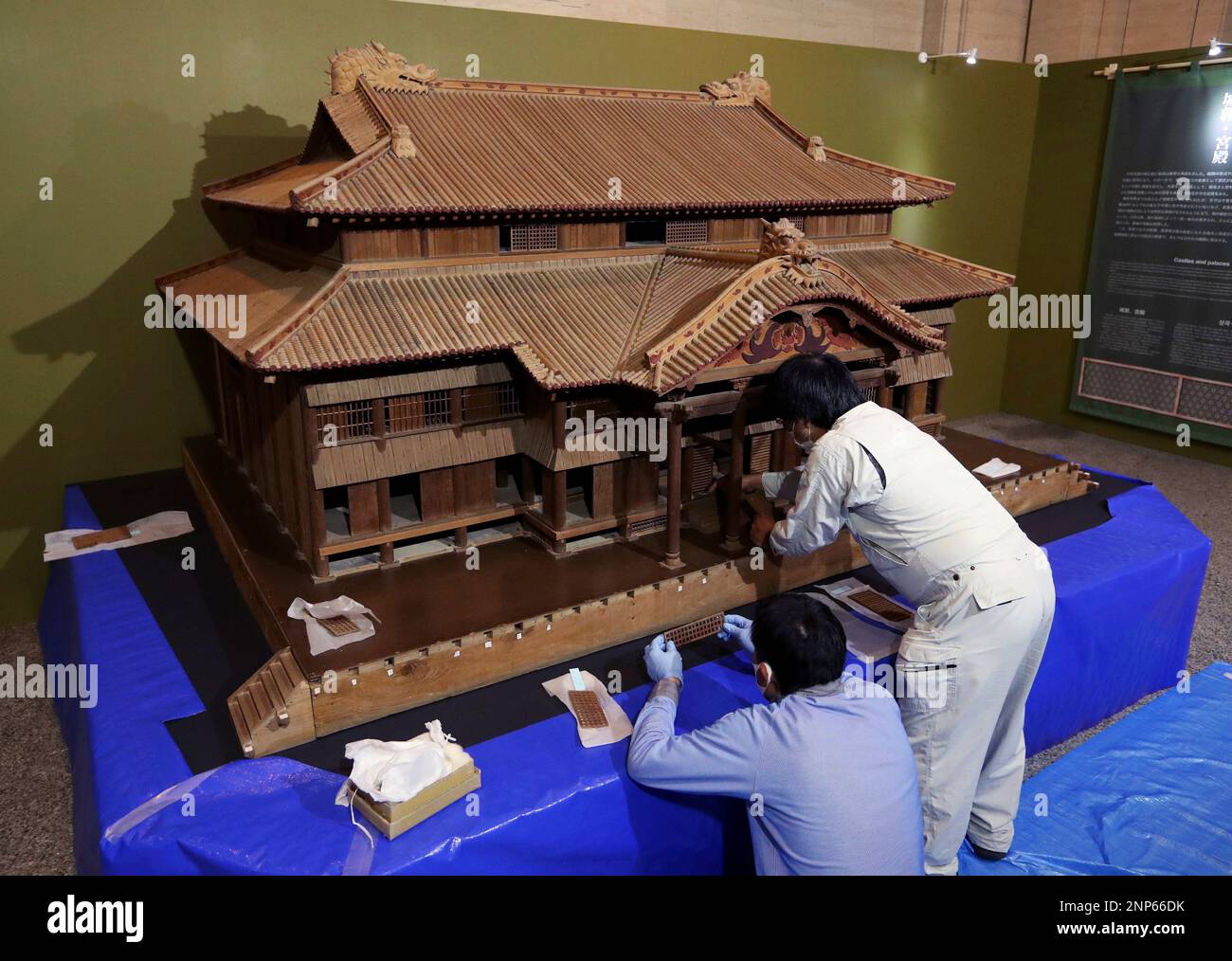 A model of Shuri Castle is brought into the Tokyo National Museum in ...