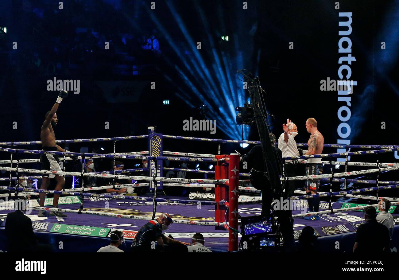 Britain's Lawrence Okolie, left, celebrates after beating Poland's ...