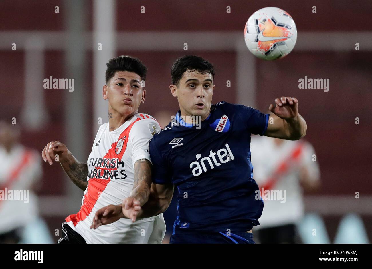 Jorge Carrascal of Argentina's River Plate, left, and Agustin Oliveros ...