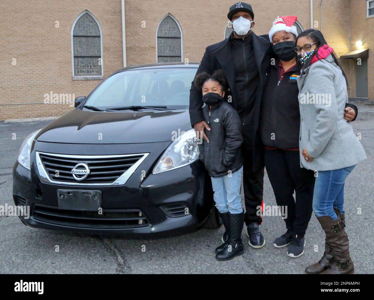 In this December 2020 photo, Nakinta Kendrick, second from right, poses ...