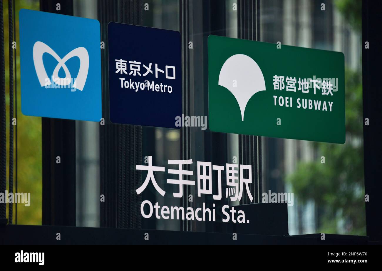 A picture taken on Dec. 8, 2020 shows logos of Tokyo Metro (L), Toei ...