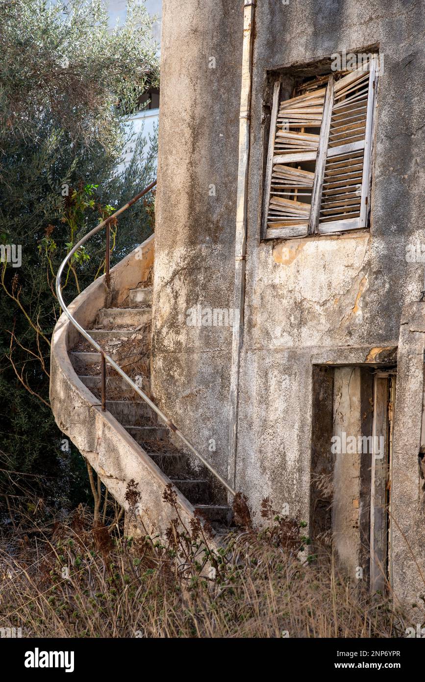 Empty abandoned deserted and collapsing urban building. Forgotten ...