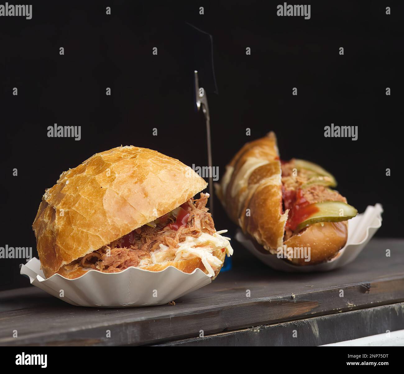 Snack stand at the Prague Farmers Market with a menu on display, a ...