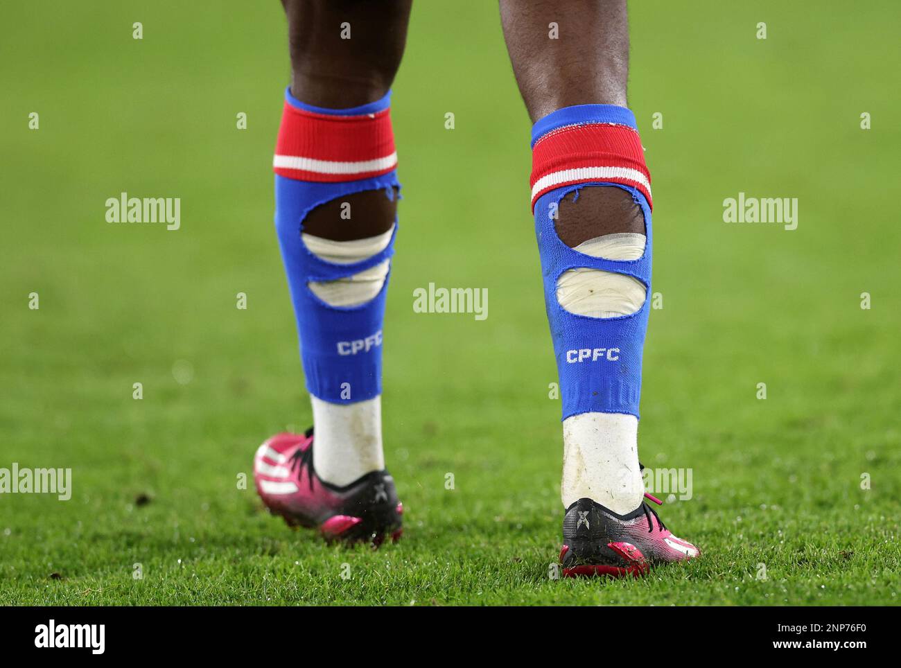 London, England, 25th February 2023. Tyrick Mitchell’s socks of Crystal ...