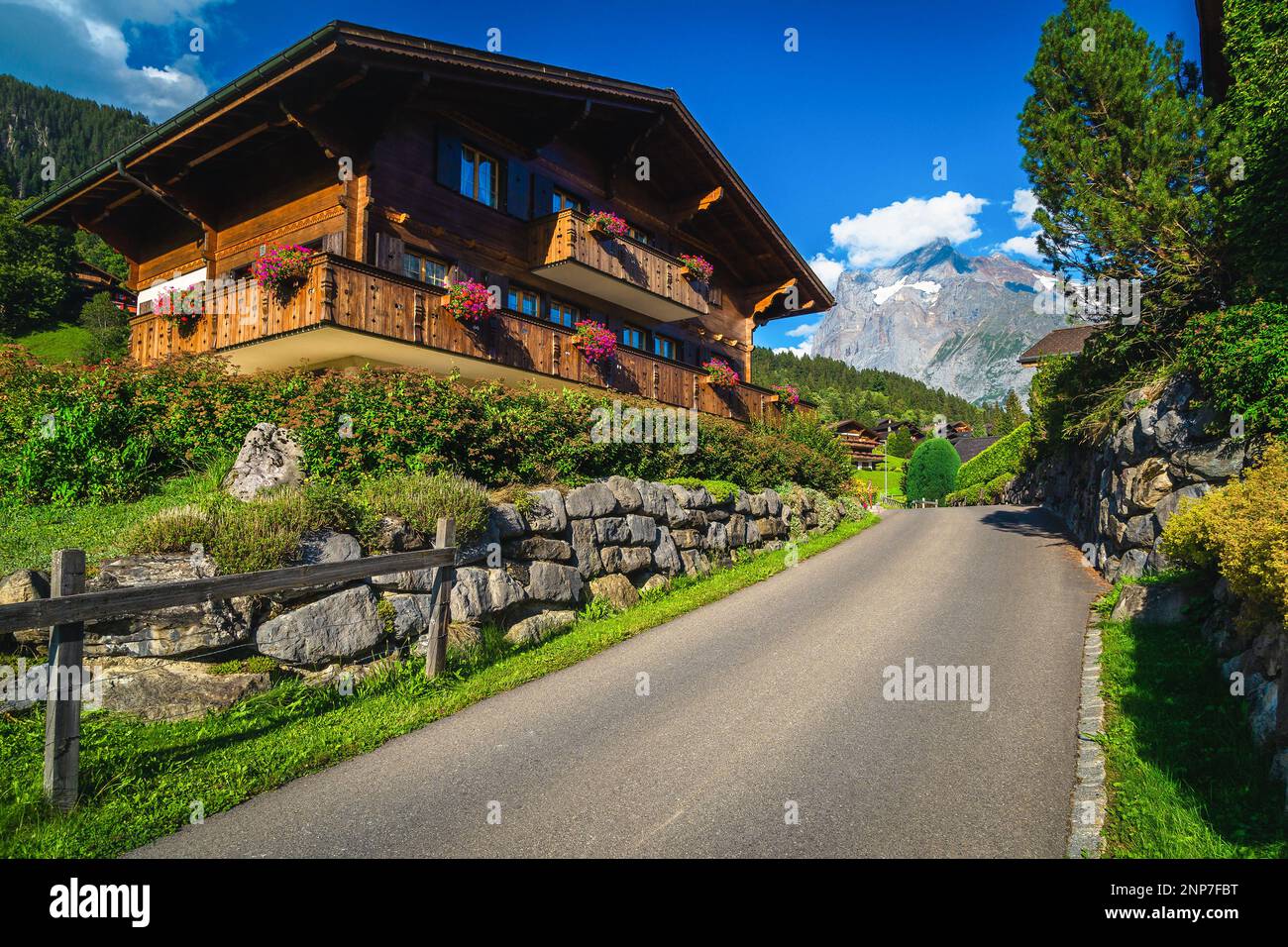 Cute wooden house and stunning street view in the fabulous alpine ...