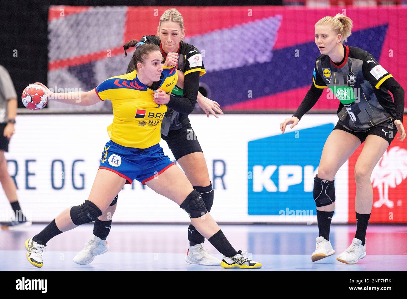 Andreea Popa of Romania, left, battles for the ball with Luisa Schulze ...