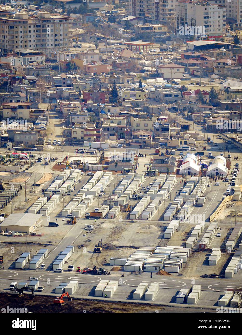 Photo shows temporary housing (bottom) in the southern Turkish town of ...