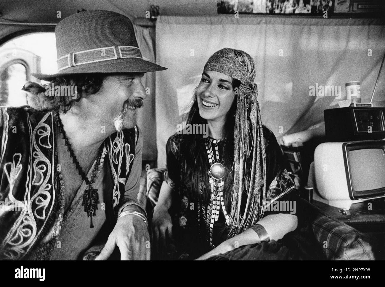 Magician Cellini and wife Eileen stand inside their bus home before ...