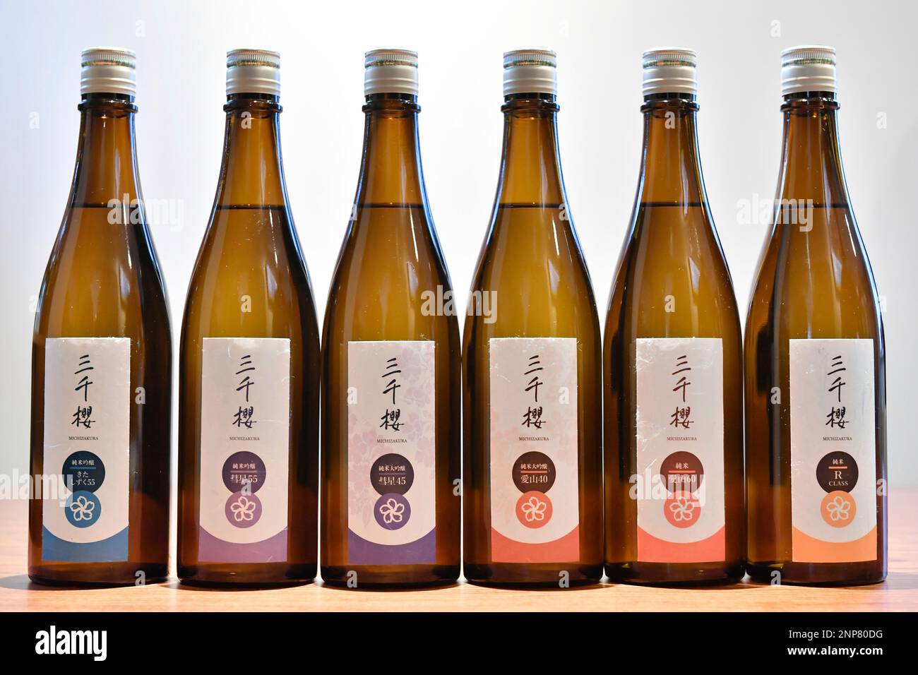 A photo shows bottles of sake (Japanese rice wine) in Higashikawa Town ...