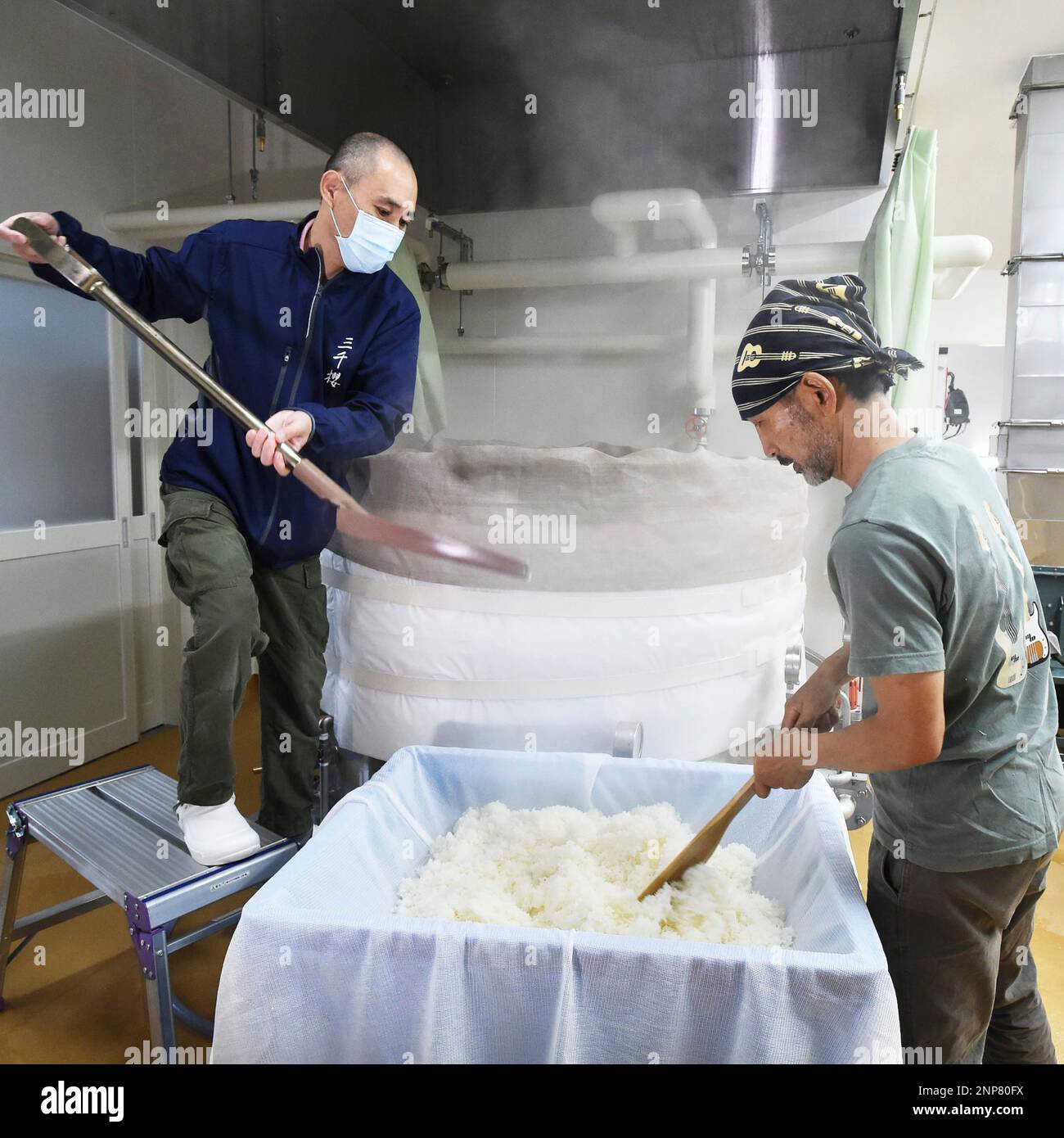 Craftsmen make sake (Japanese rice wine) in Higashikawa Town, Hokkaido ...