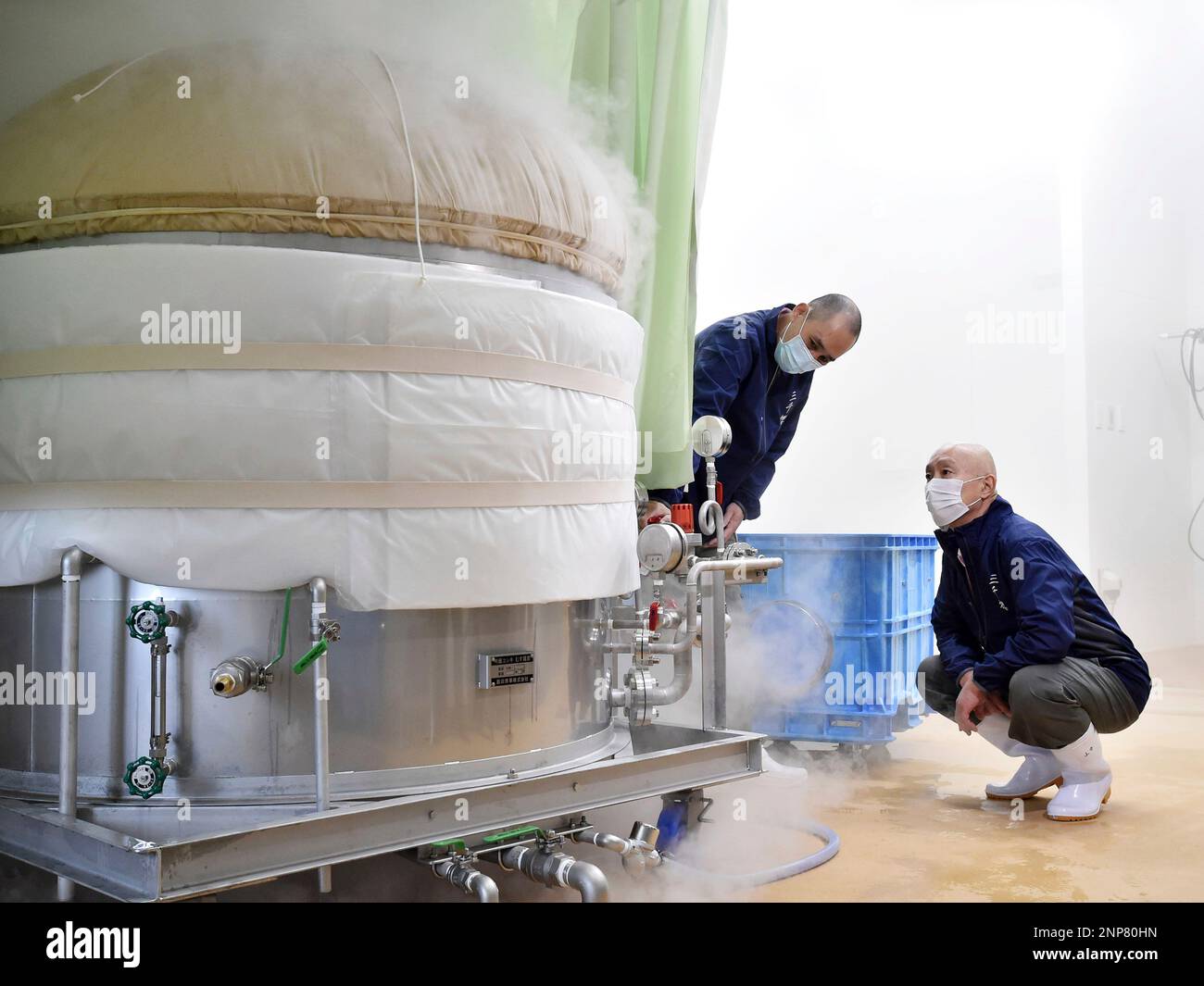 Craftsmen make sake (Japanese rice wine) in Higashikawa Town, Hokkaido ...