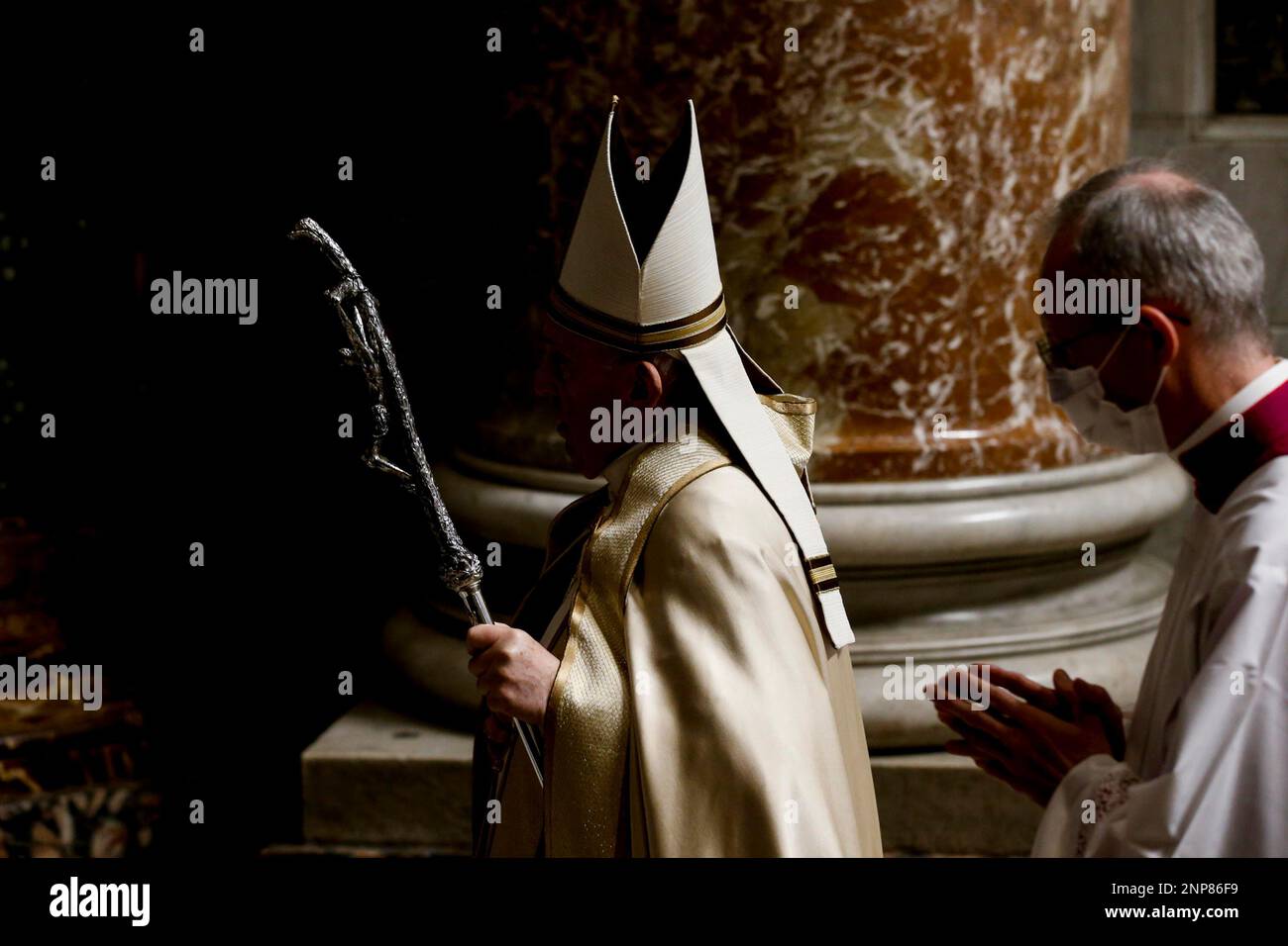 Pope Francis leaves at the end of a consistory ceremony where 13 ...