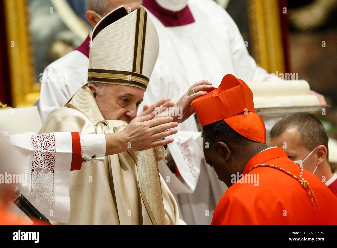 Rwandan newly Cardinal Antoine Kambanda receives his biretta as he is ...