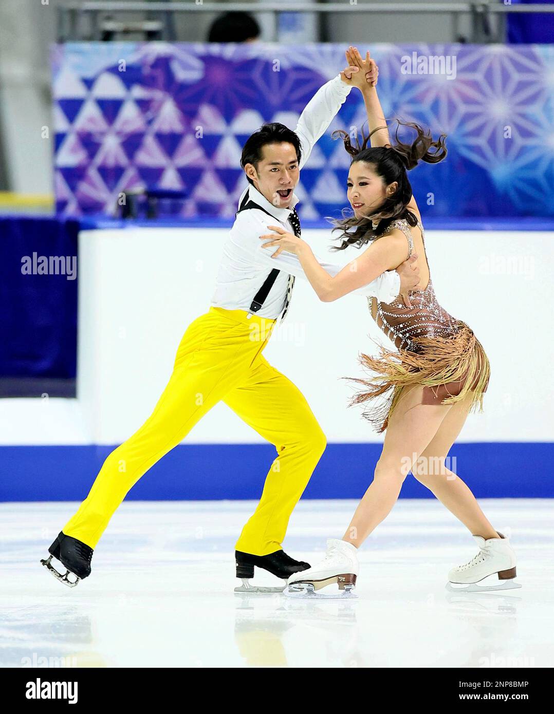 Kana Muramoto and Daisuke Takahashi perform during the Rhythm Dance of ...